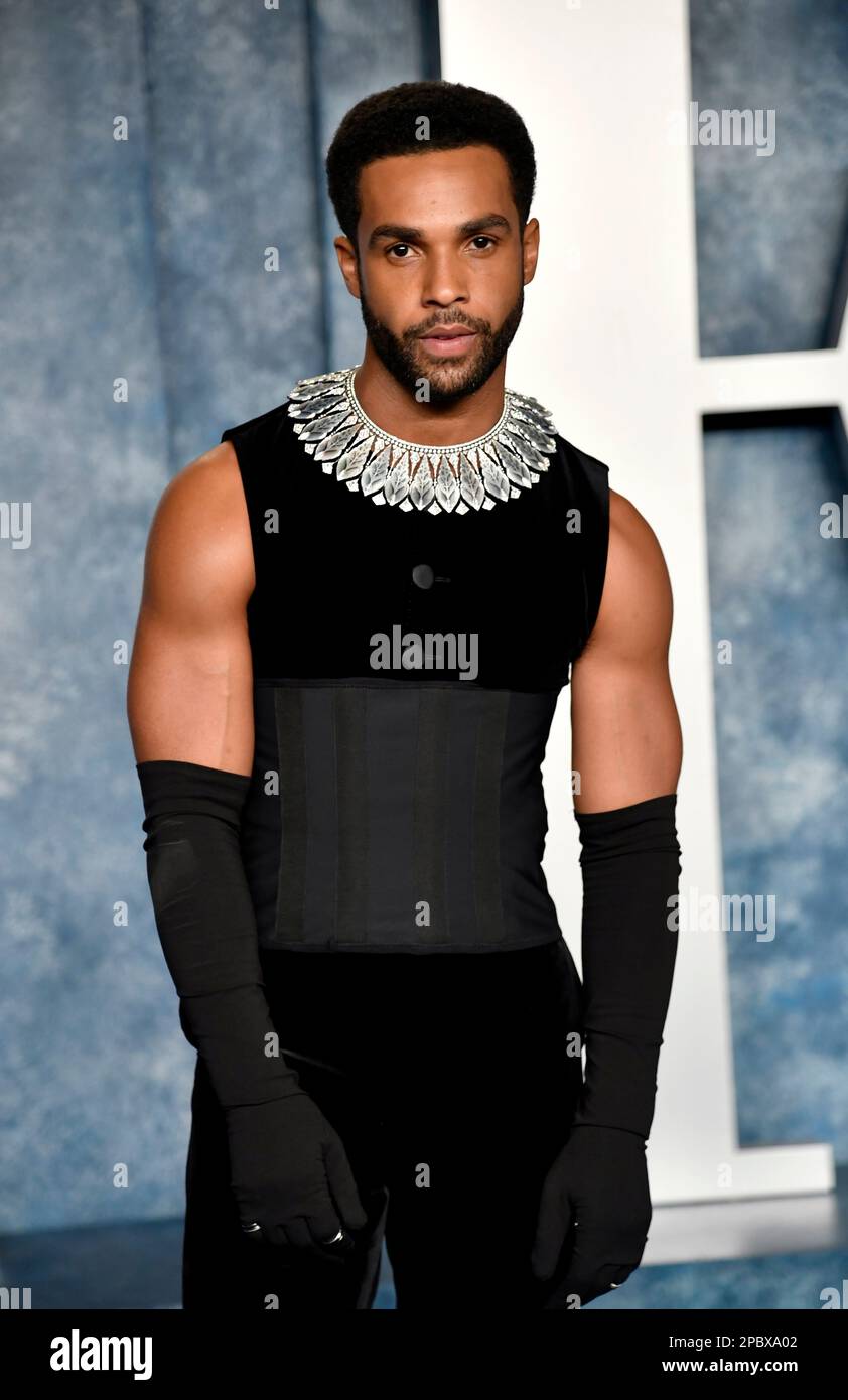 Lucien Laviscount arrives at the Vanity Fair Oscar Party on Sunday ...