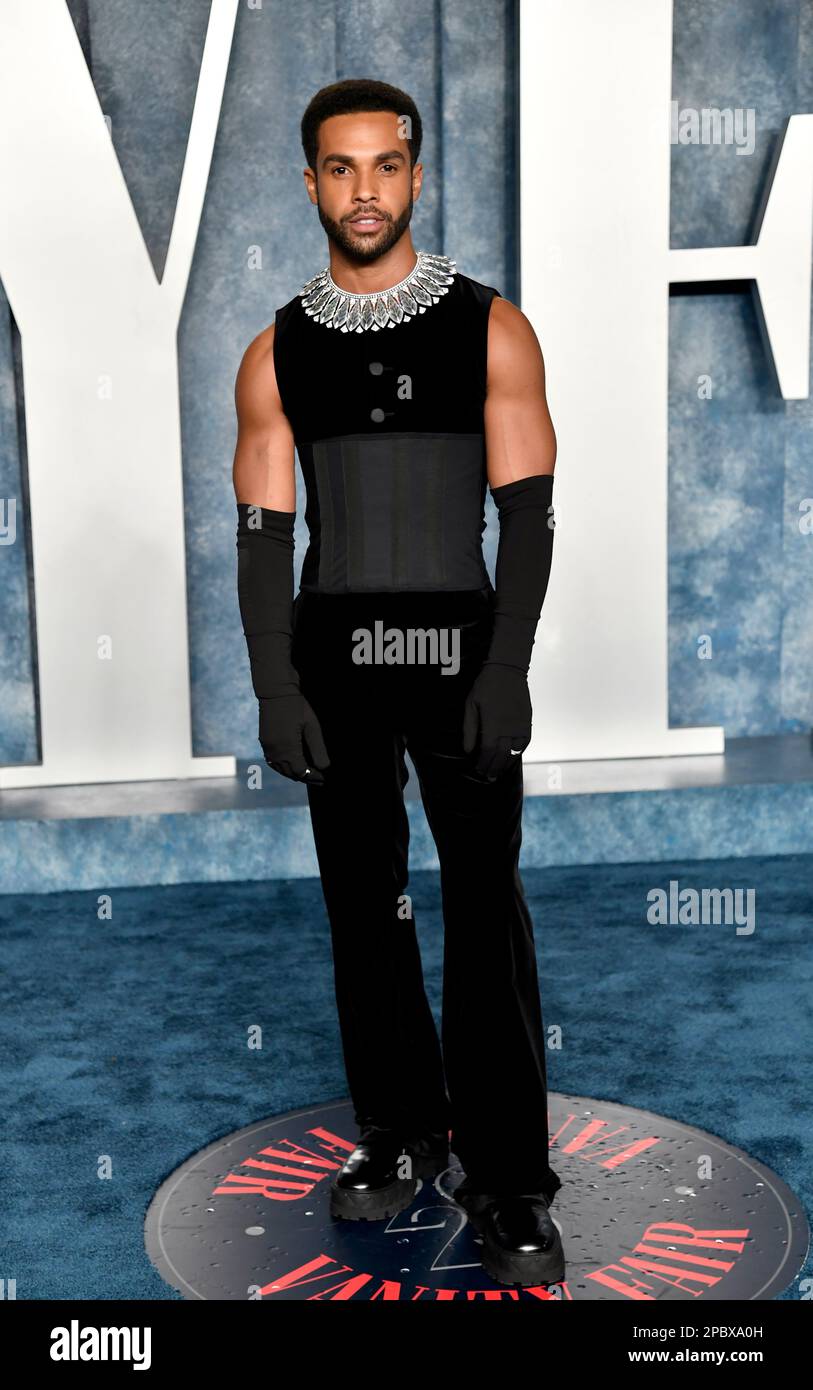 Lucien Laviscount arrives at the Vanity Fair Oscar Party on Sunday ...
