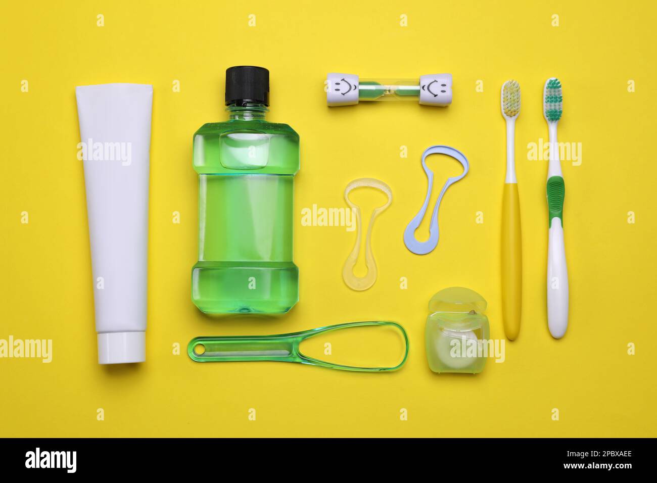 Flat lay composition with tongue cleaners and teeth care products on ...