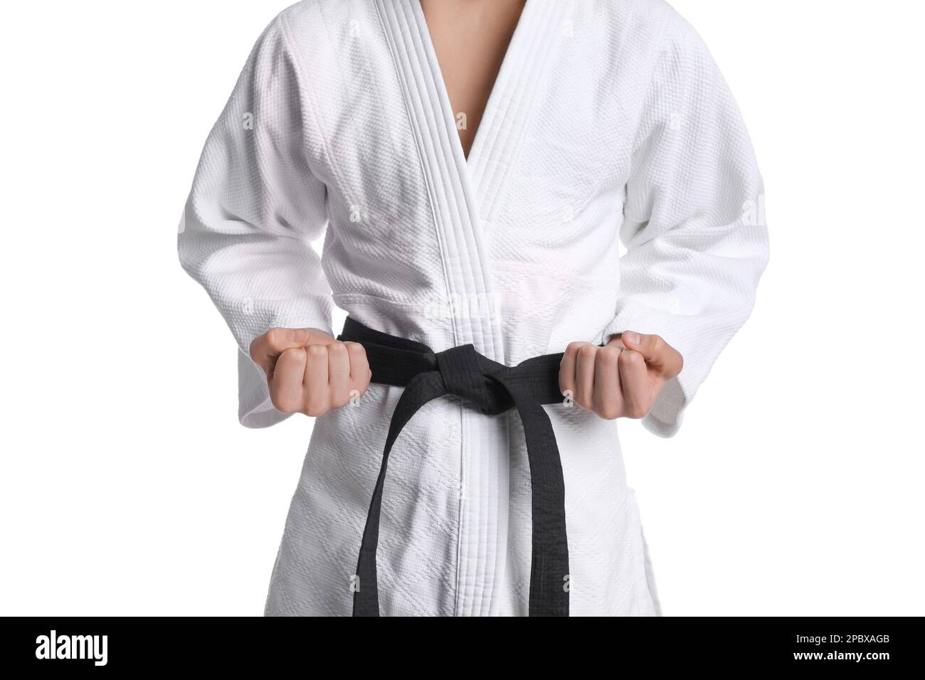 Martial arts master in keikogi with black belt on white background ...