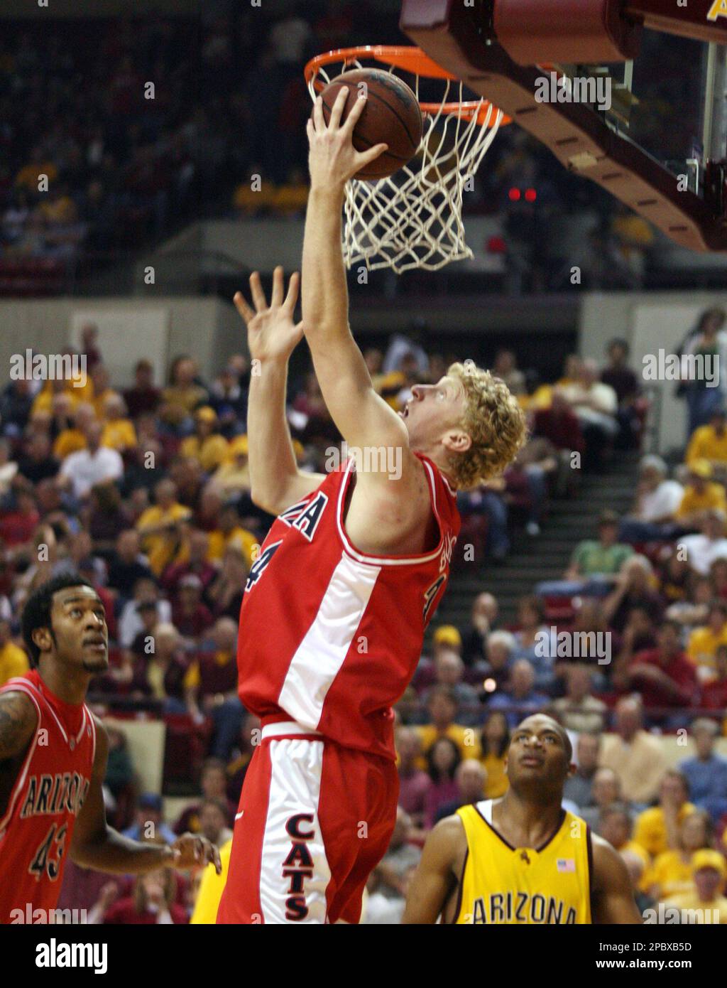 Arizona forward Chase Budinger hits the reverse lay up against Arizona ...