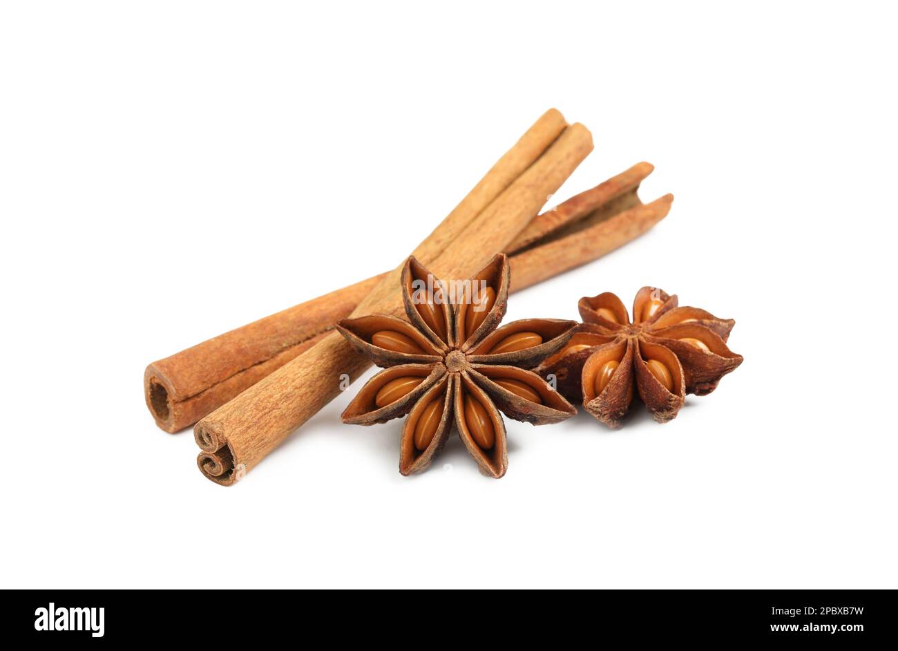 Dry anise stars and cinnamon sticks on white background Stock Photo - Alamy