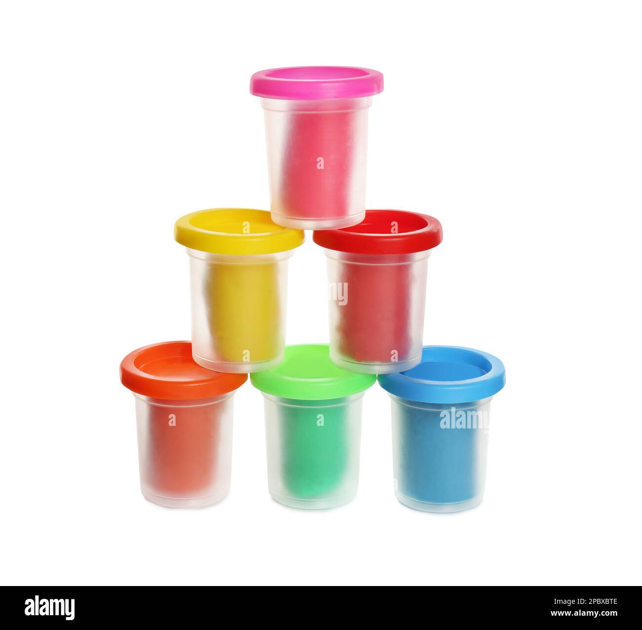 Plastic containers with colorful play dough on white background Stock ...