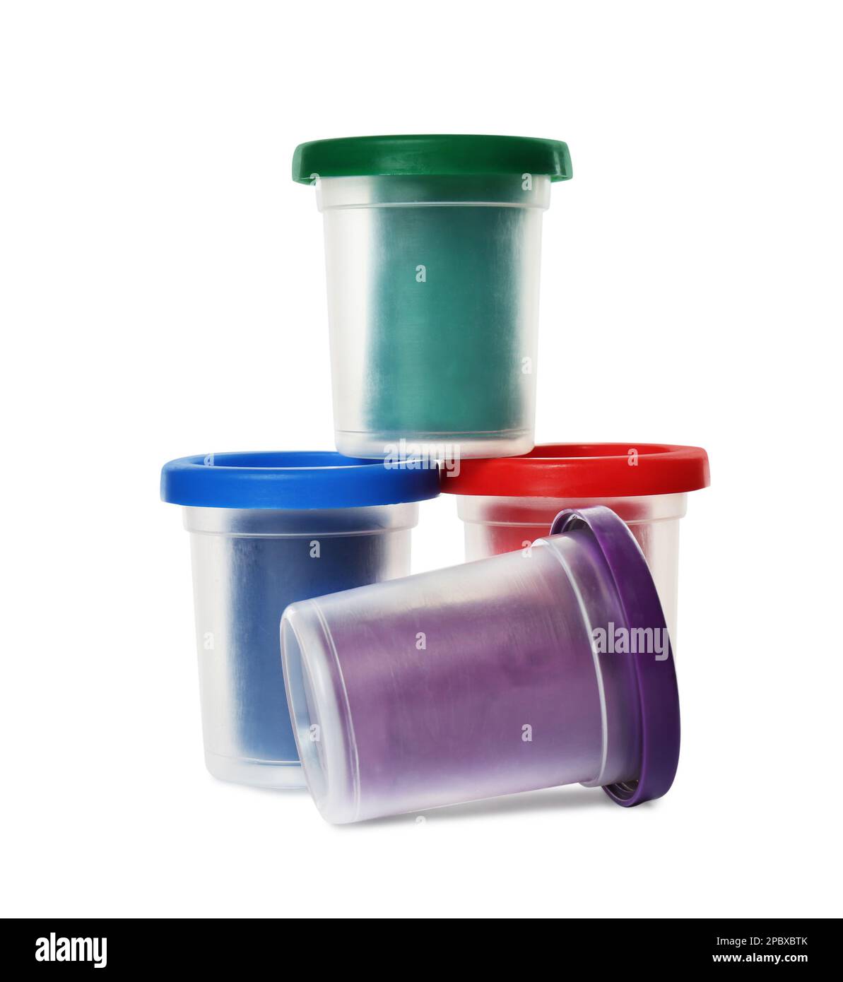 Plastic containers with colorful play dough on white background Stock ...