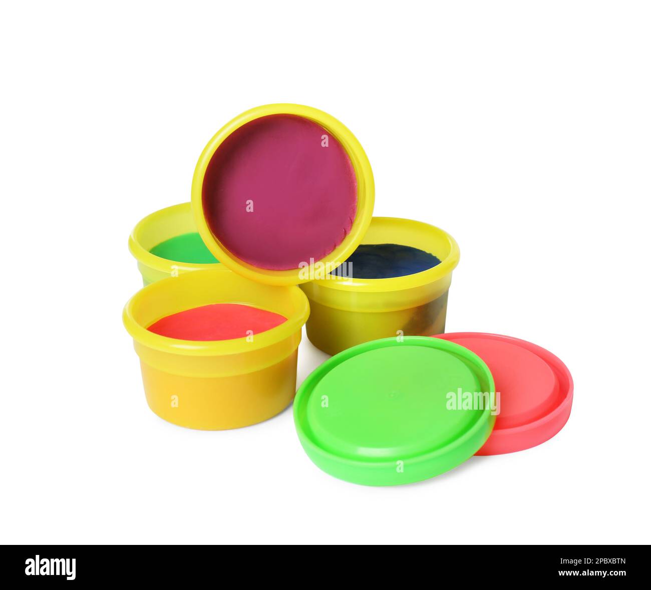 Plastic containers with colorful play dough on white background Stock ...