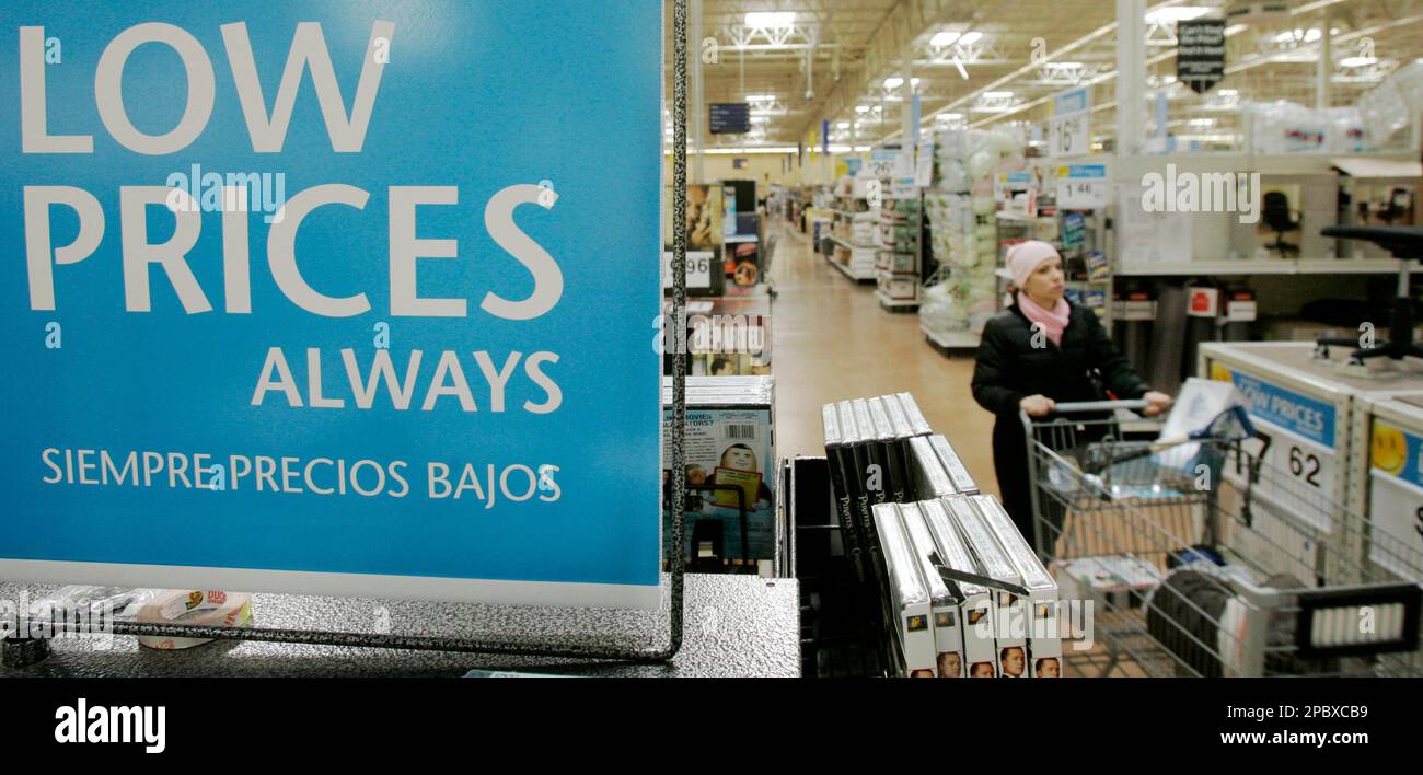 Bilingual signs are prominent in Chicago's first Wal-Mart on Thursday ...