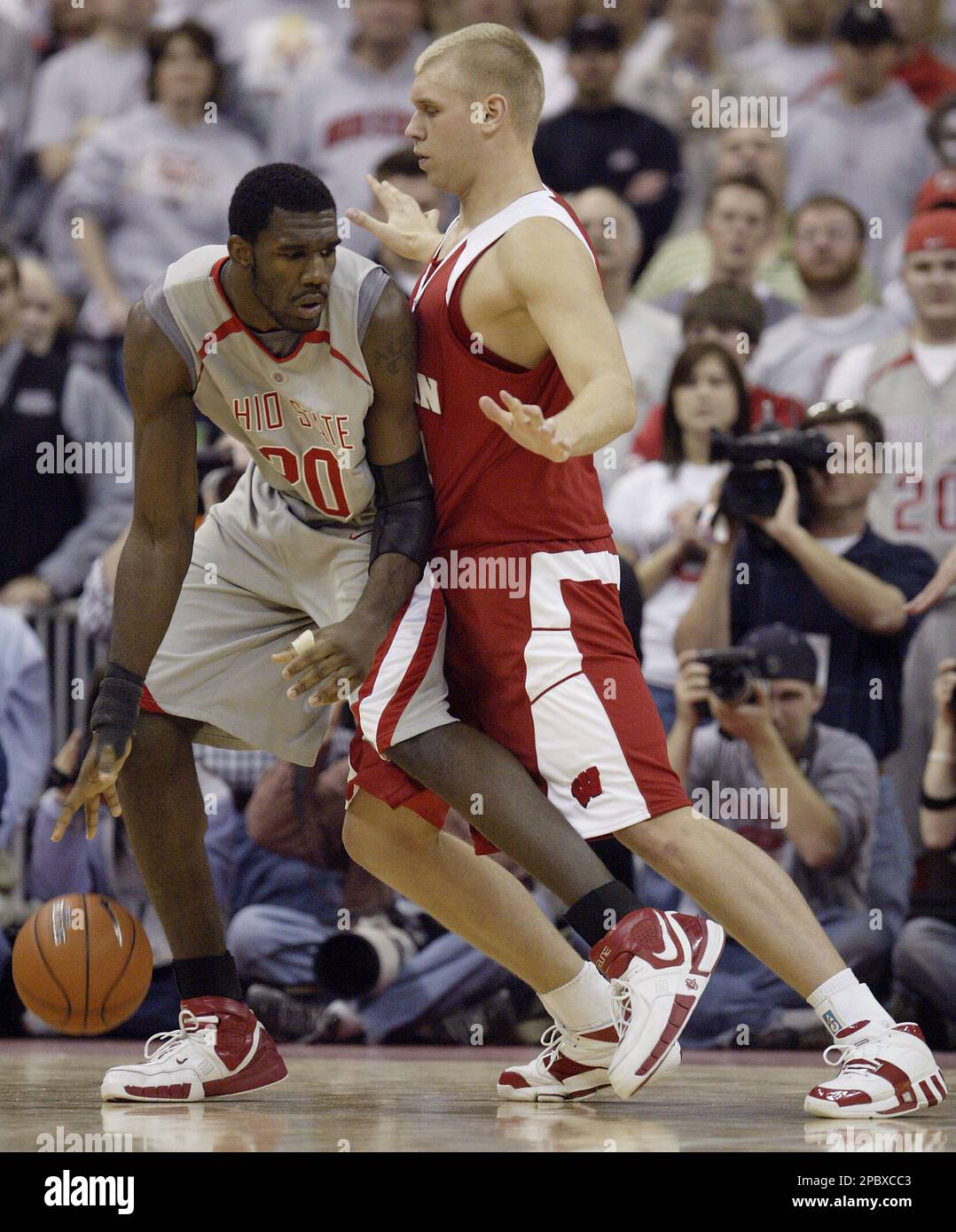 Ohio State's Greg Oden, left, posts up against Wisconsin's Greg ...