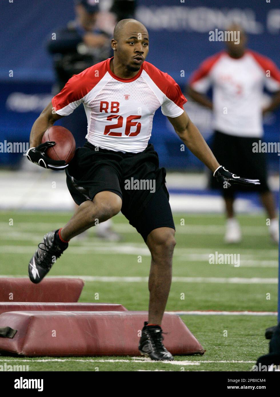 Texas running back Ramonce Taylor runs a drill during workouts at the ...