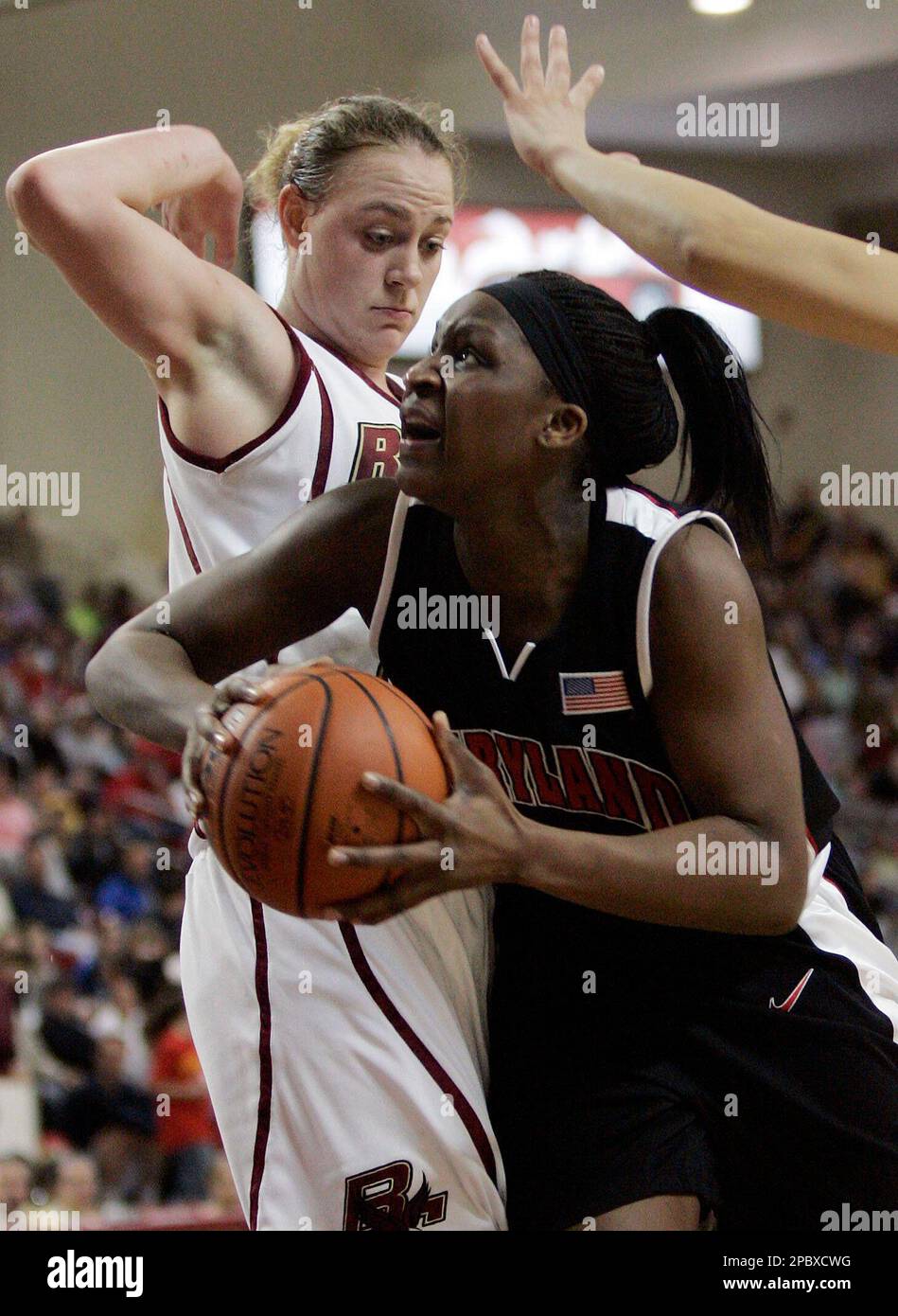 Maryland's Crystal Langhorne, right, shoots over Boston College's ...