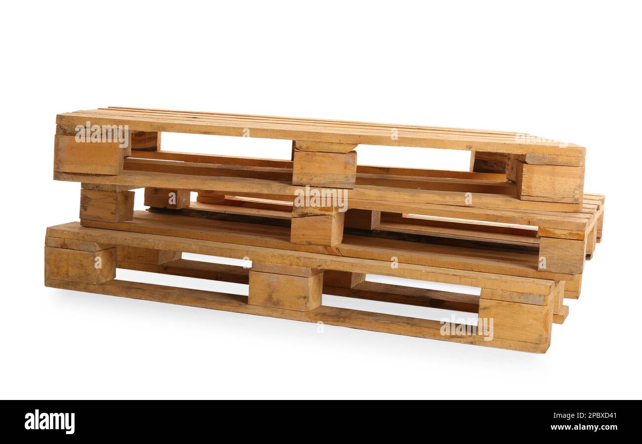 Stacked wooden pallets isolated on white. Transportation and storage ...