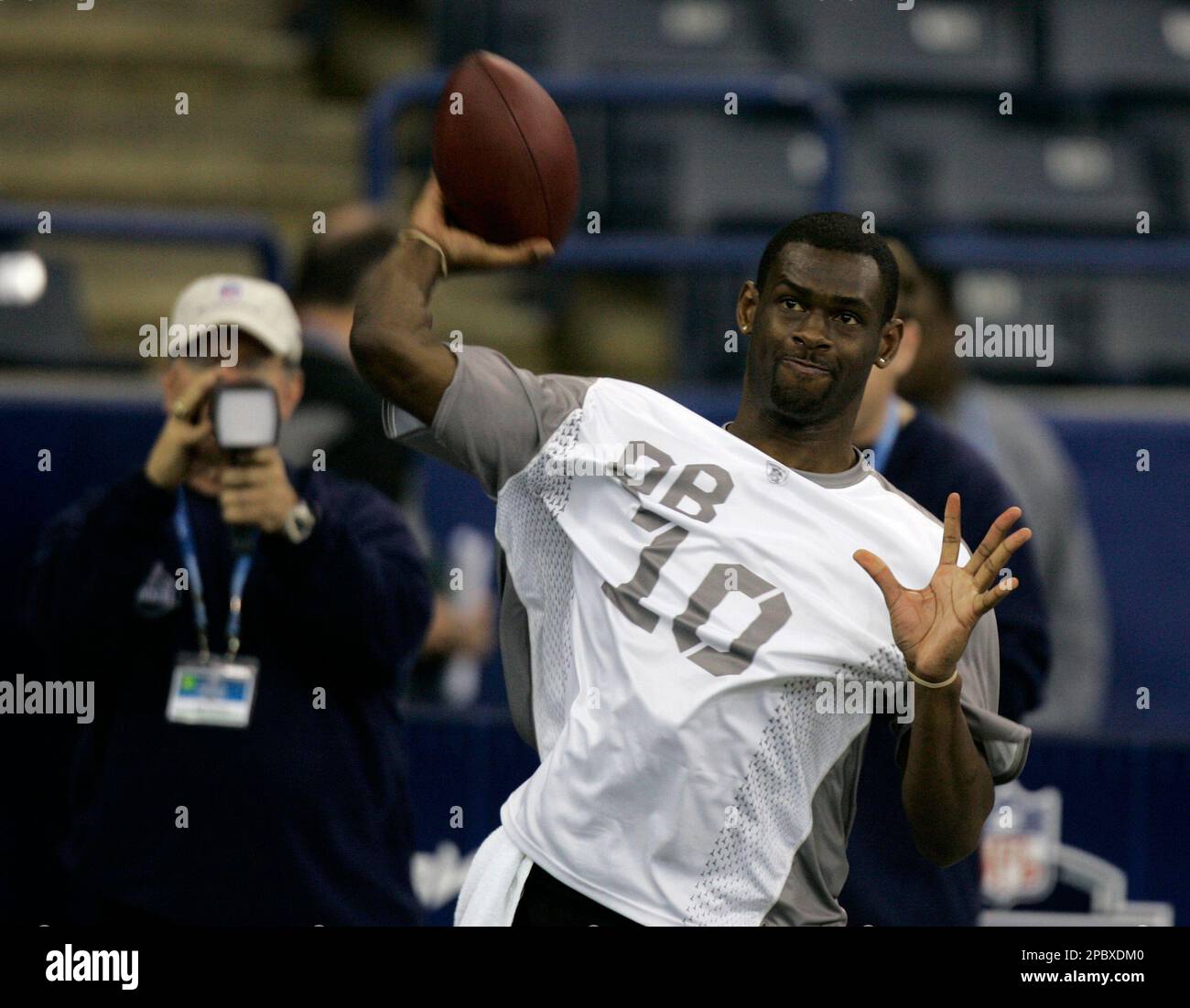 Quarterback James Pinkney of East Carolina is checked by a radar gun as ...