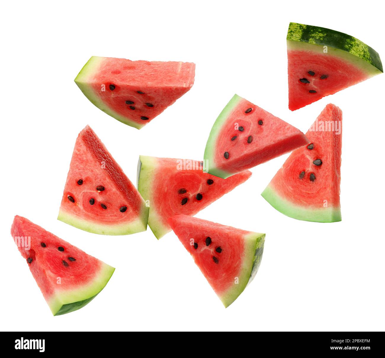 Slices of delicious ripe watermelon falling on white background Stock ...