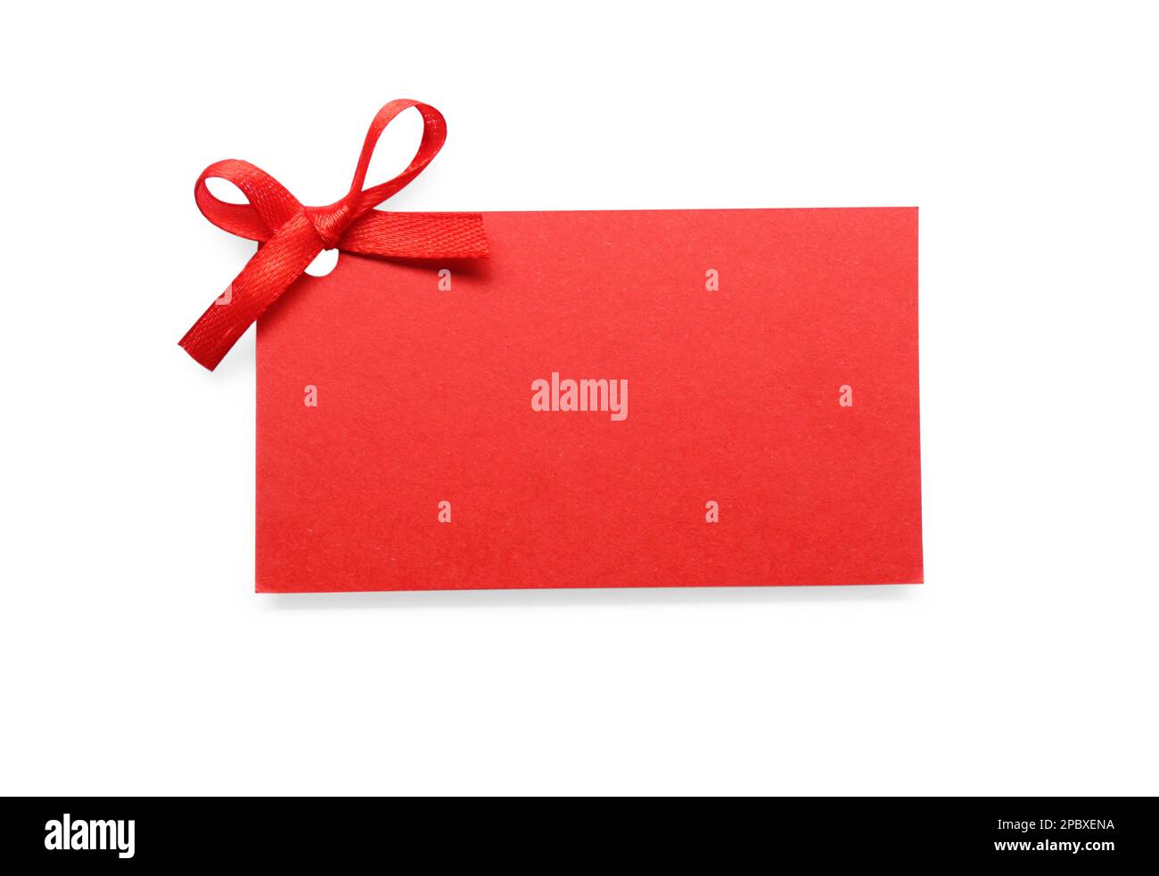 Blank red gift tag with satin ribbon on white background, top view ...
