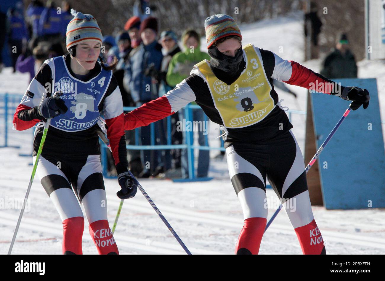 Kenai's Maya Johnson, right, tags teammate Molly Watkins in the girls ...