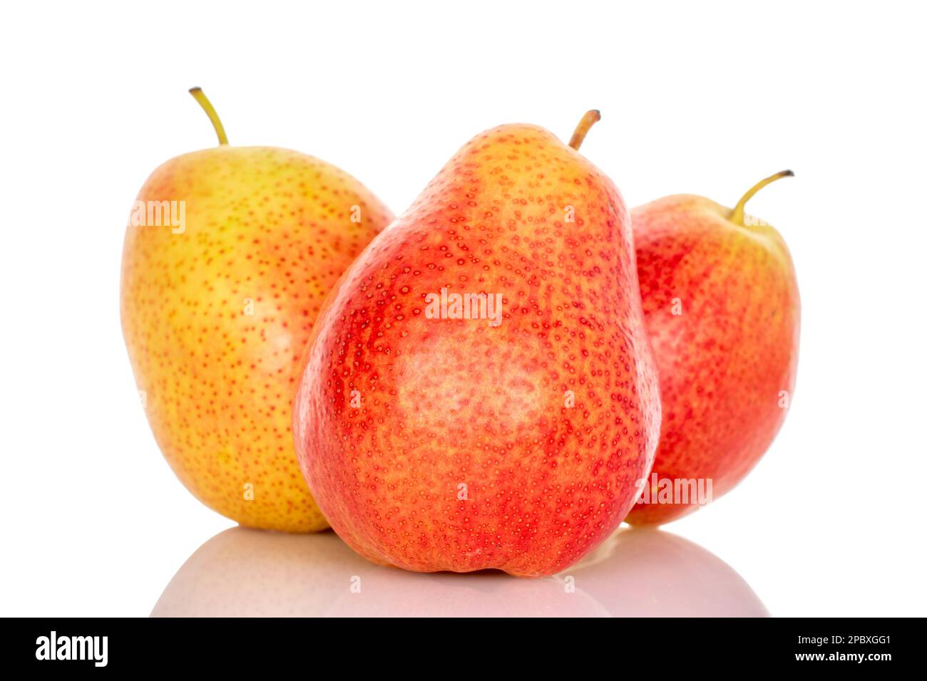 Three yellow-red pears, close-up, on a white background Stock Photo - Alamy