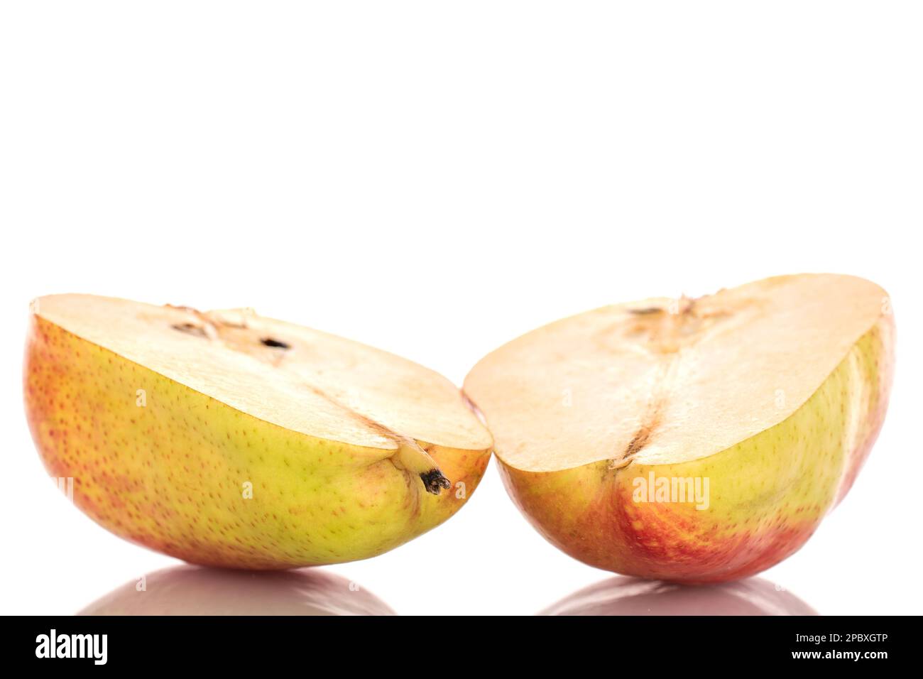 Two halves of ripe pears, close-up, on a white background Stock Photo ...