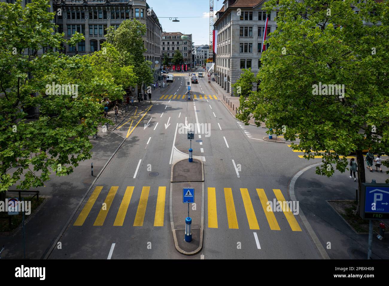 A yellow zebra pedestrian crosswalk in Zurich city Switzerland. Low ...