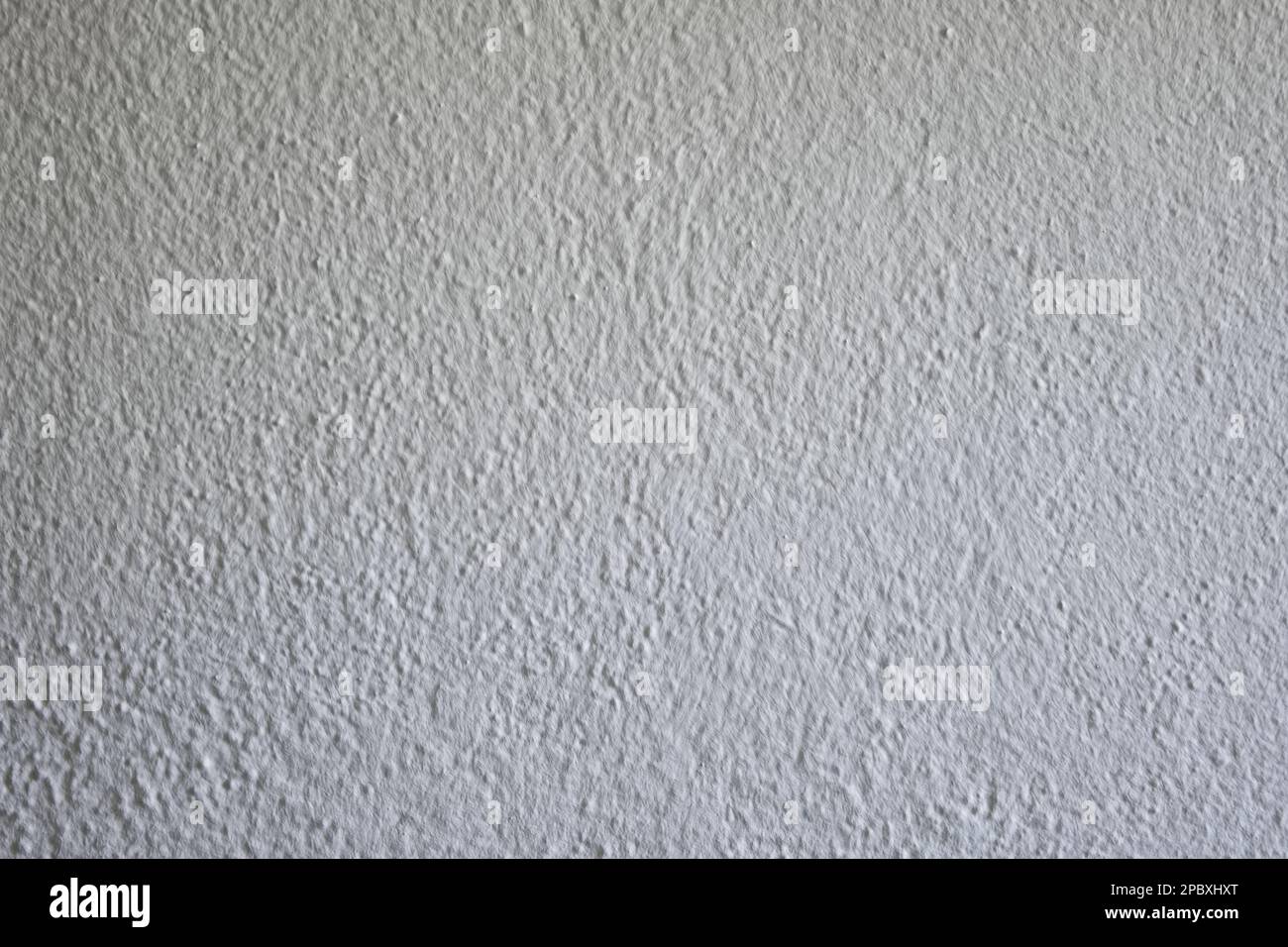 White grainy stucco wall texture, no people Stock Photo - Alamy