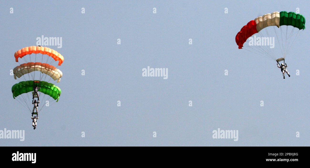 An Indian Air Force (IAF) skydiving team displays their para jumping ...