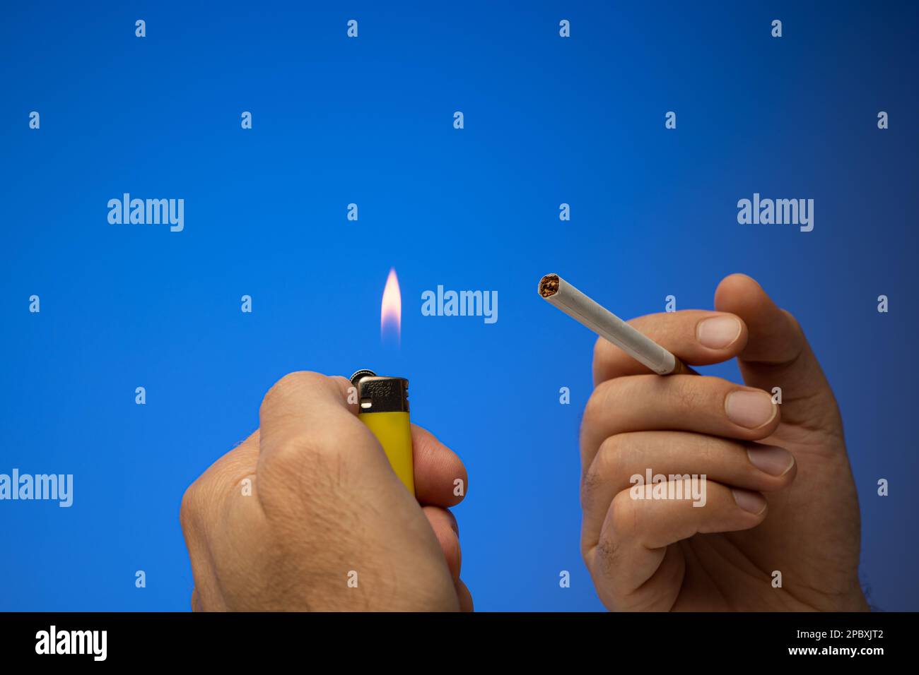 Man hand holding lighter white hi-res stock photography and images - Alamy