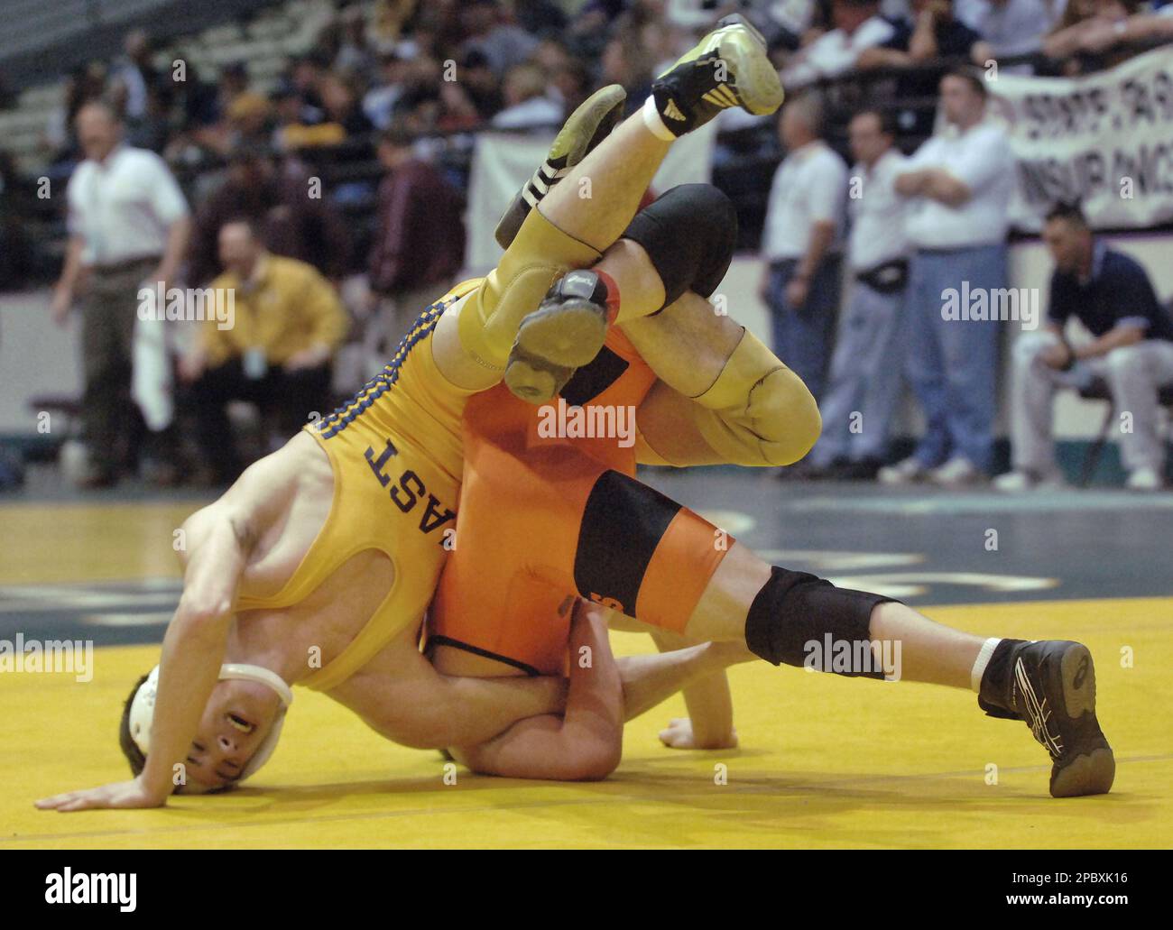 East Fairmont's Zach Morton, left, and Elkin's Chris Swisher battle for ...