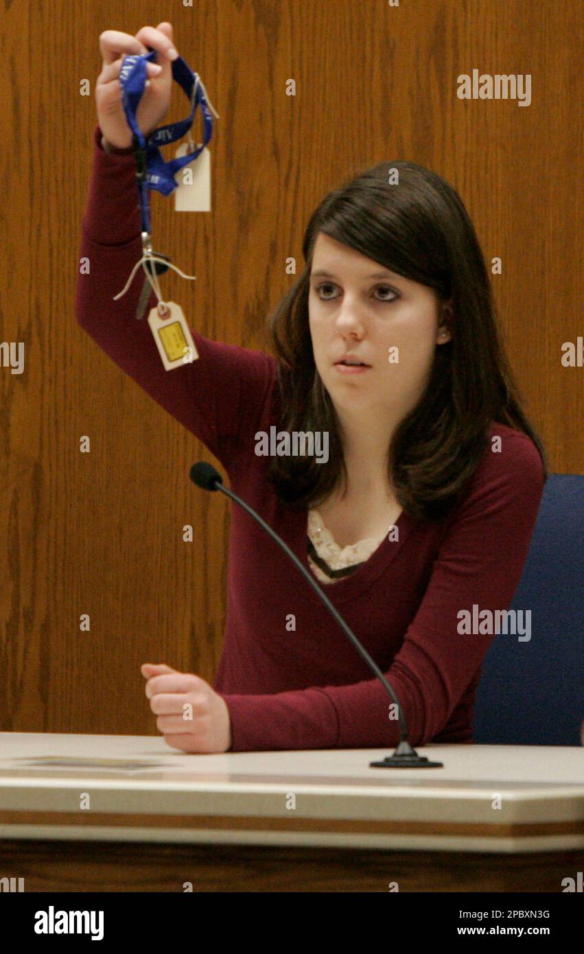 Katie Halbach holds an Air National Guard lanyard identical to the one ...