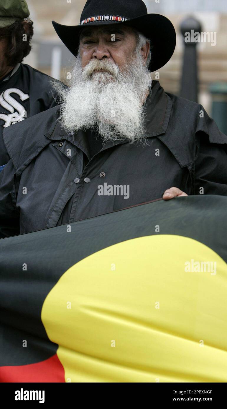 Aboriginal Australian Bob Weatherall poses for the media with an ...