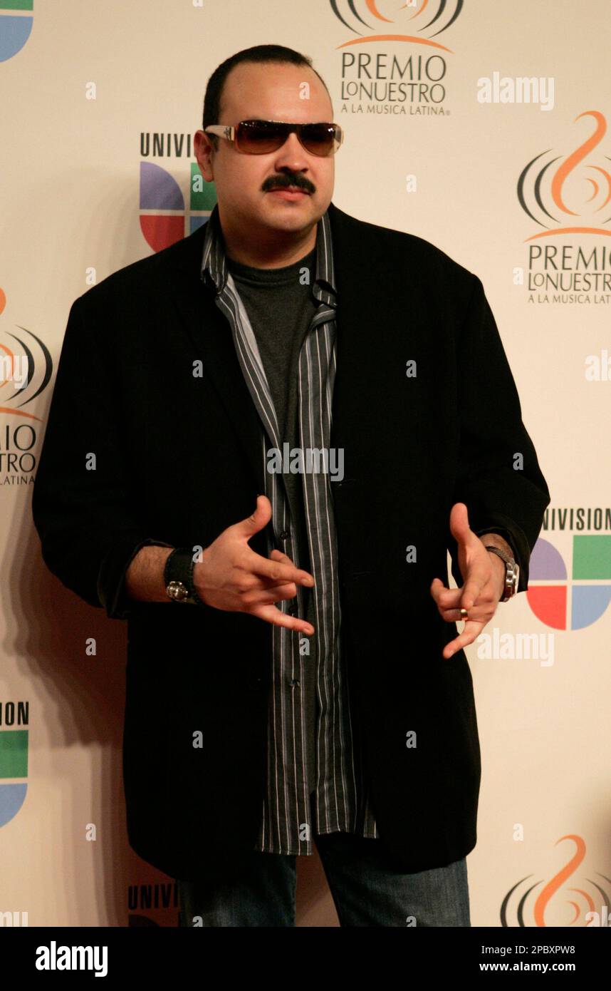 Mexican singer Pepe Aguilar poses on the red carpet as he arrives for ...