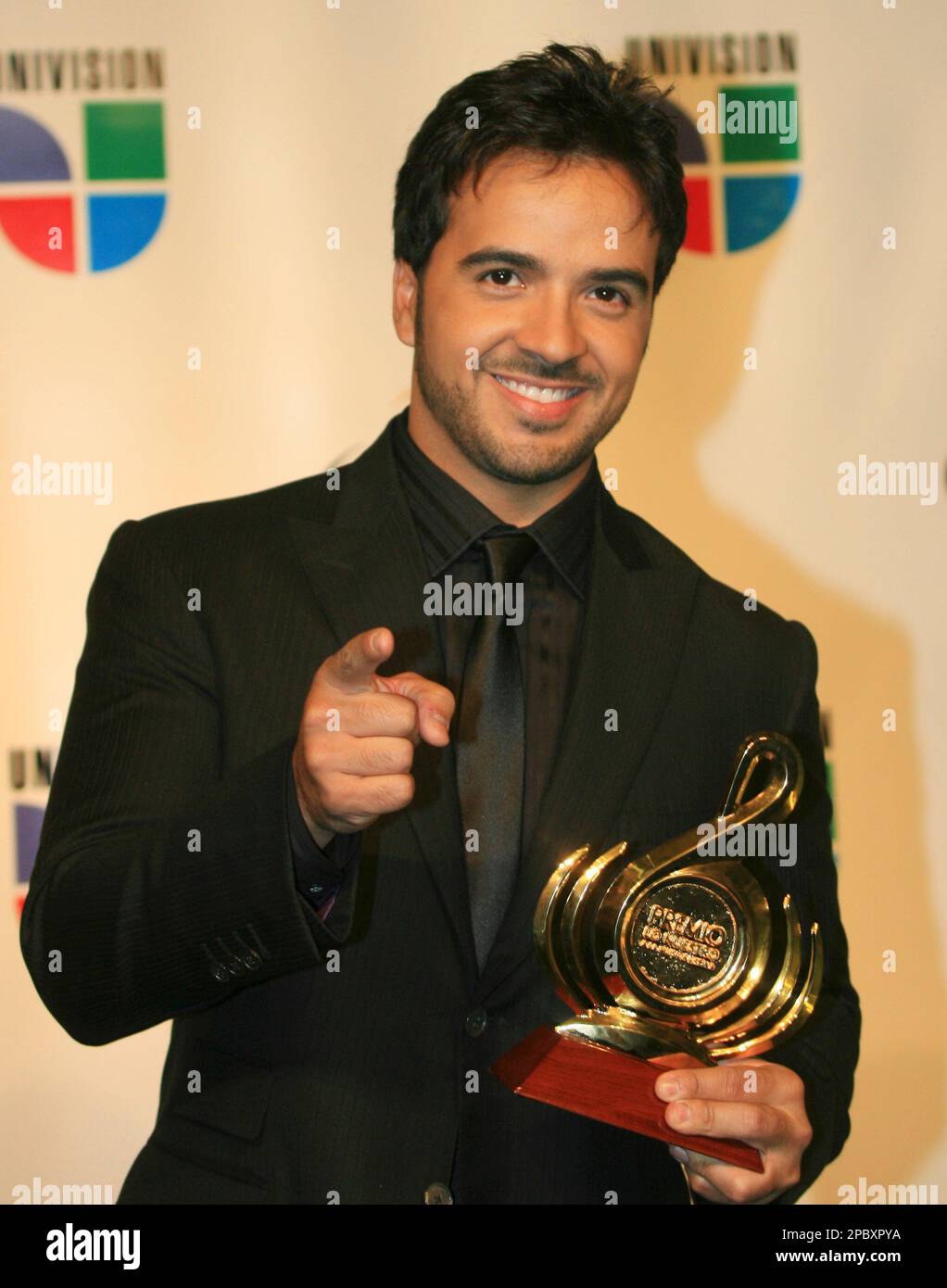 Puerto Rican singer Luis Fonsi poses backstage at Premio Lo Nuestro ...