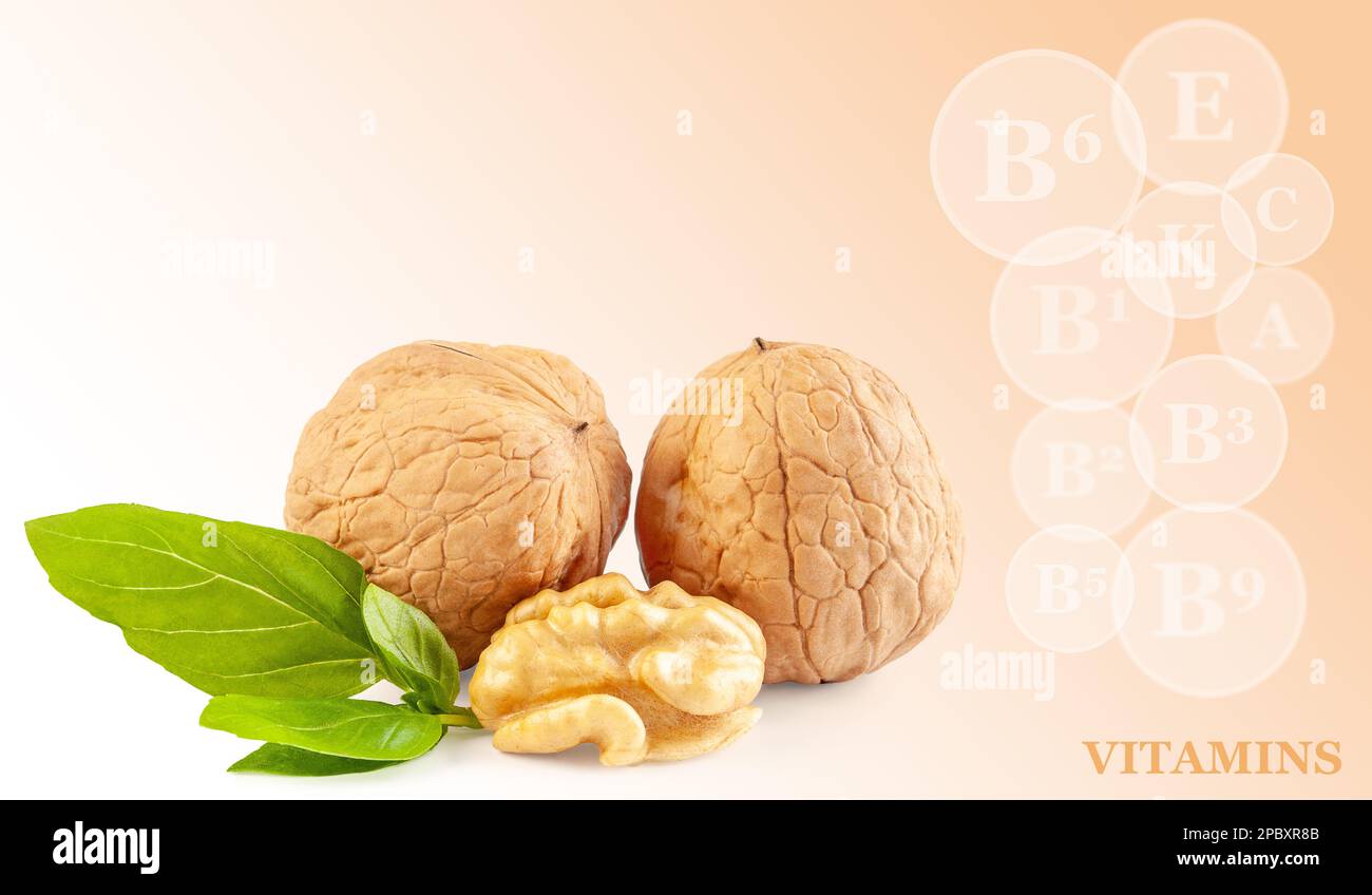 fresh kernels, broken and whole walnuts close-up isolated on color ...