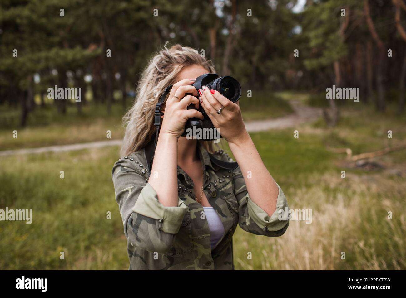Photographer woman camera backstage concept Stock Photo - Alamy
