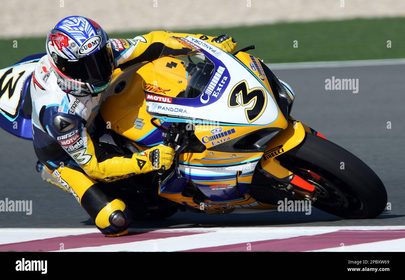 Italian rider Max Biaggi steers his Suzuki motorcycle during the first ...