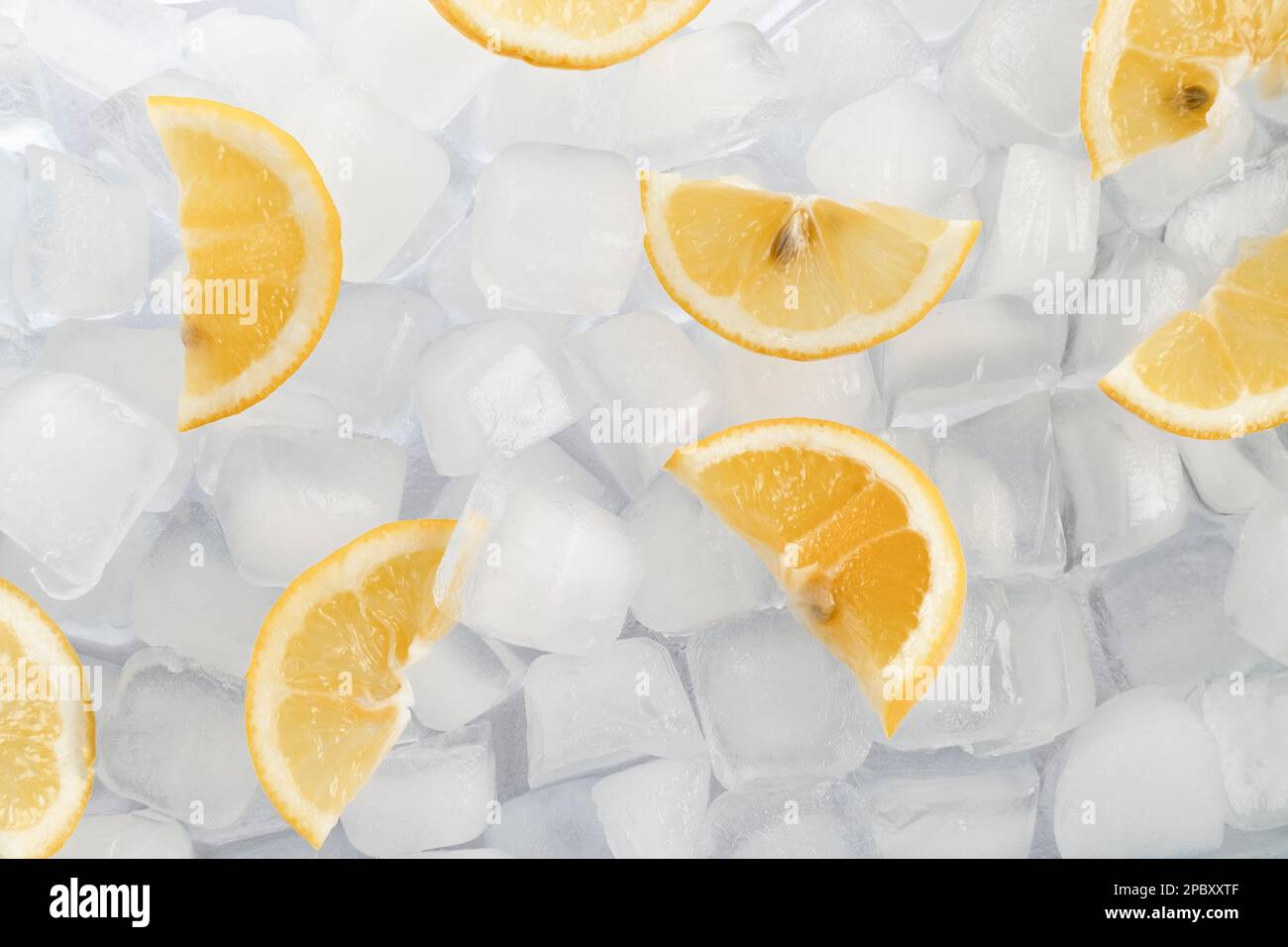 Ice cubes and lemon slices, refreshing food concept, food background ...