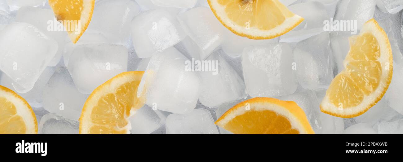 Ice cubes and lemon slices, refreshing food concept, food background ...