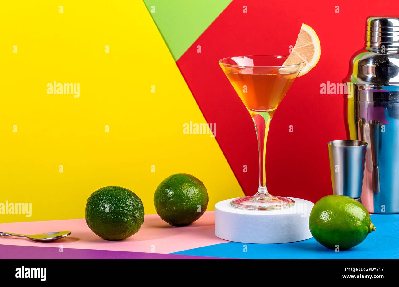 Yellow bird cocktail with white rum, liquor and lime juice in martini ...