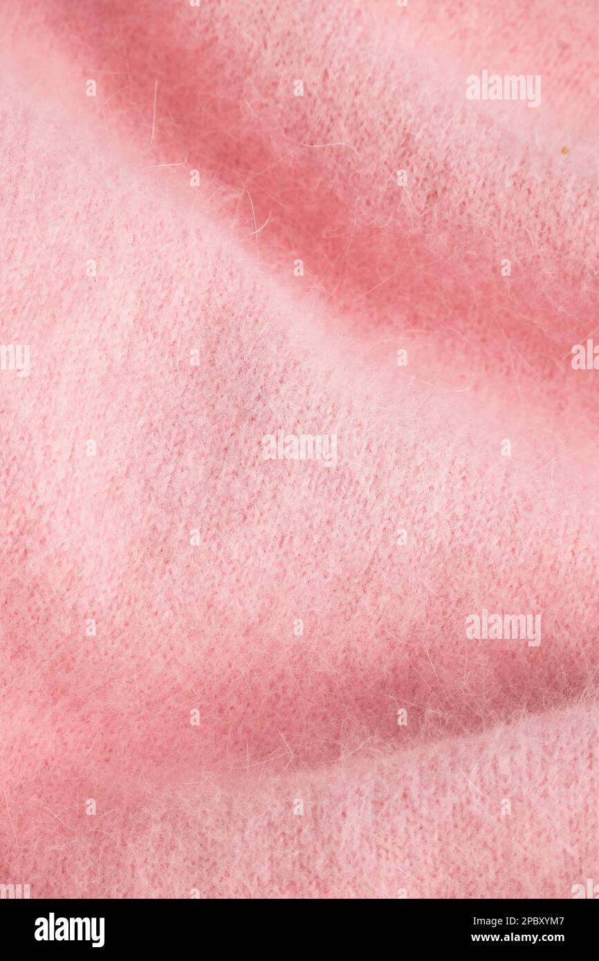 Close up of soft pink angora cloth, textile detail in pastel colors ...