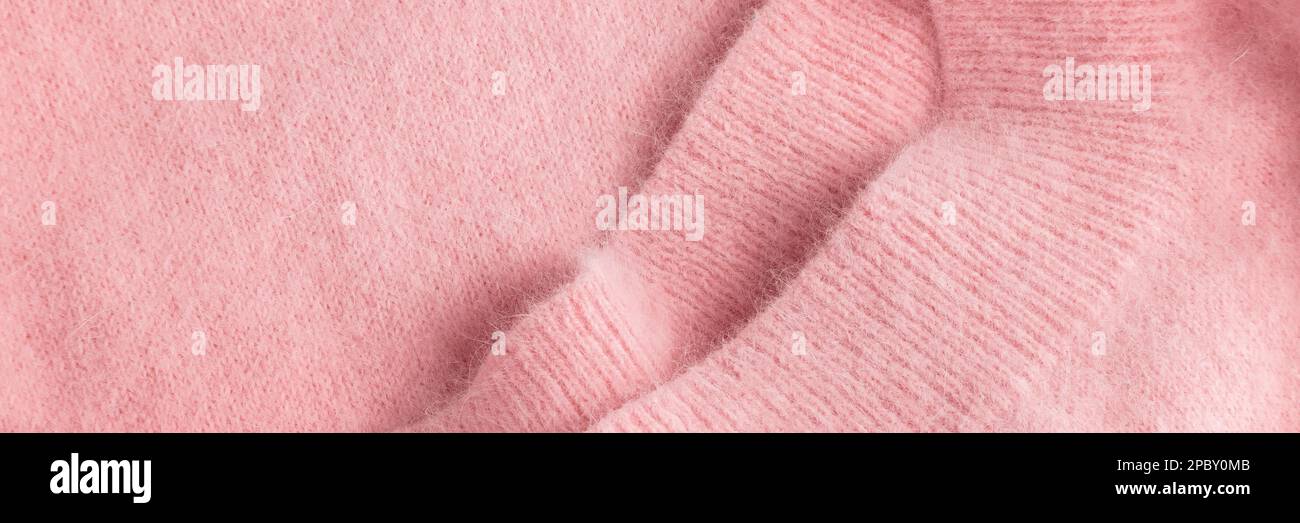 Close up of soft pink angora cloth, textile detail in pastel colors ...