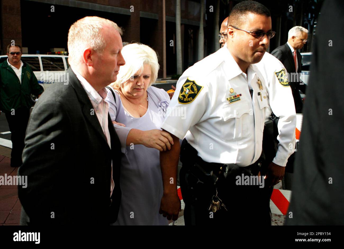 Anna Nicole Smith's mother Virgie Arthur is escorted into the Broward ...