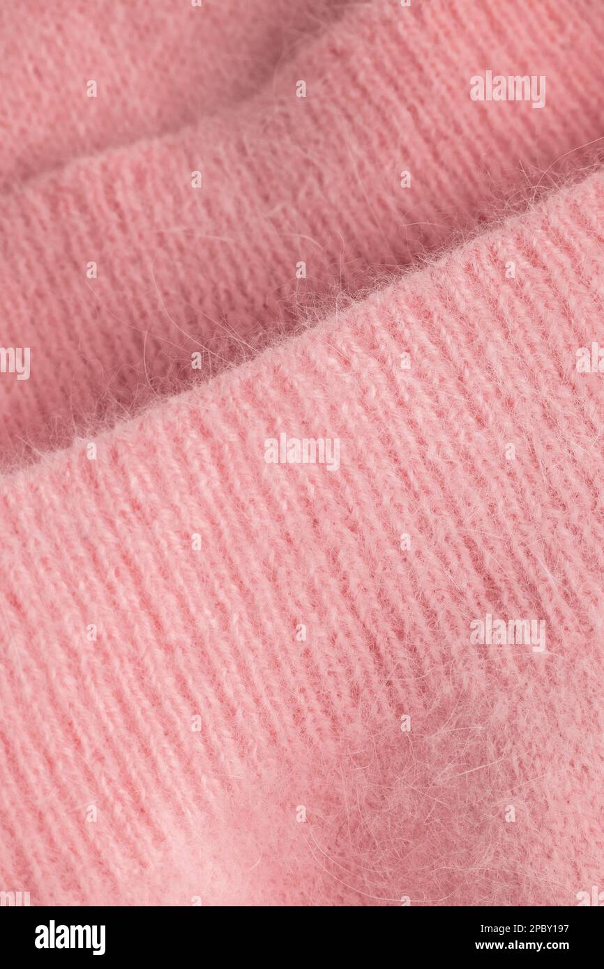 Close up of soft pink angora cloth, textile detail in pastel colors ...