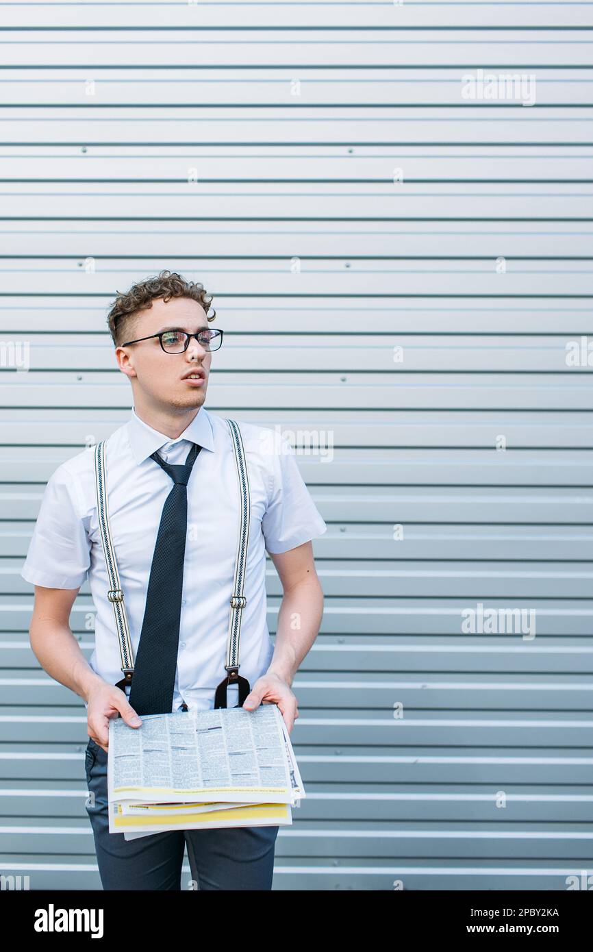 information unexpected news man at loss newspaper Stock Photo - Alamy