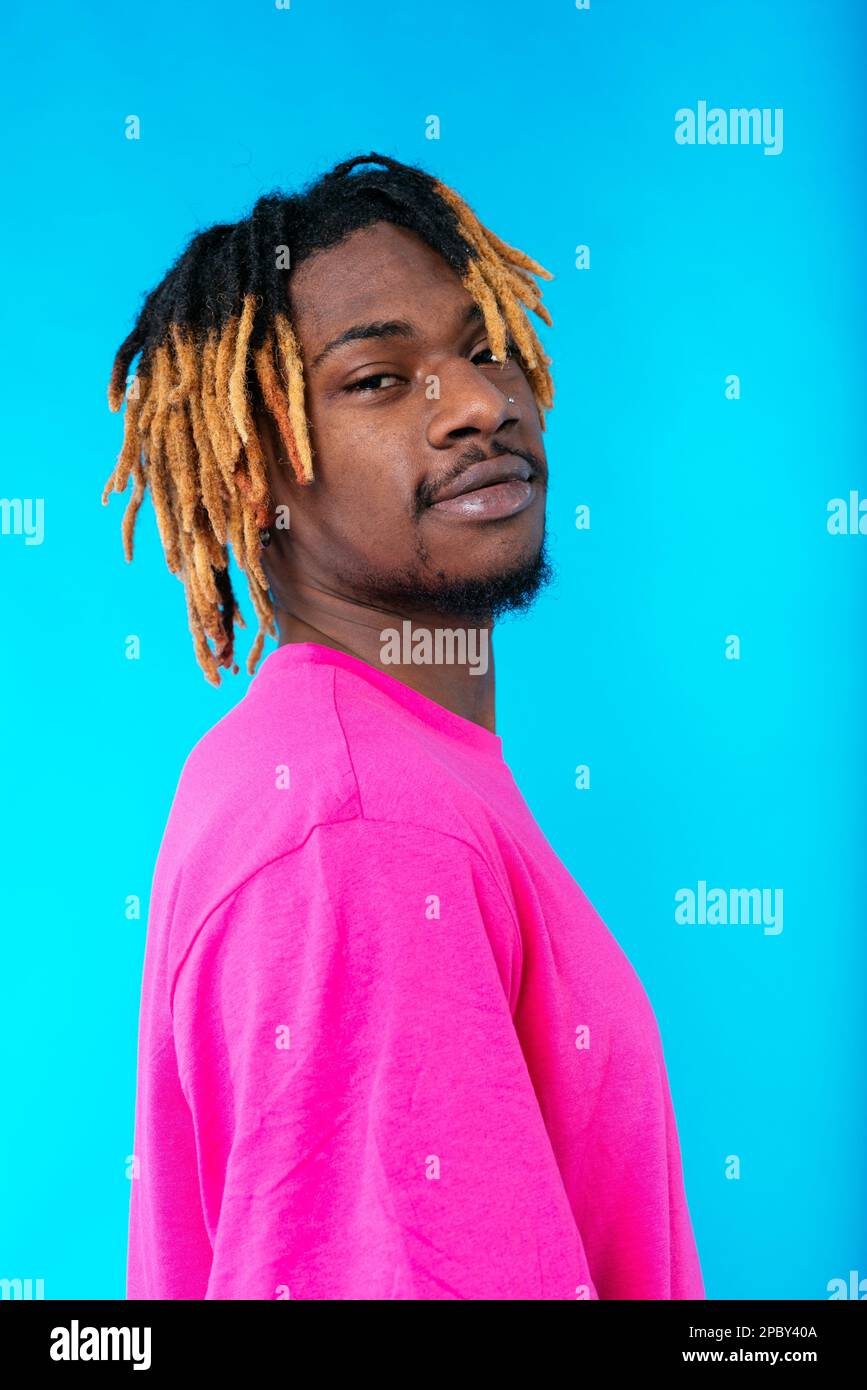 Side view of self assured young African American male model with ...