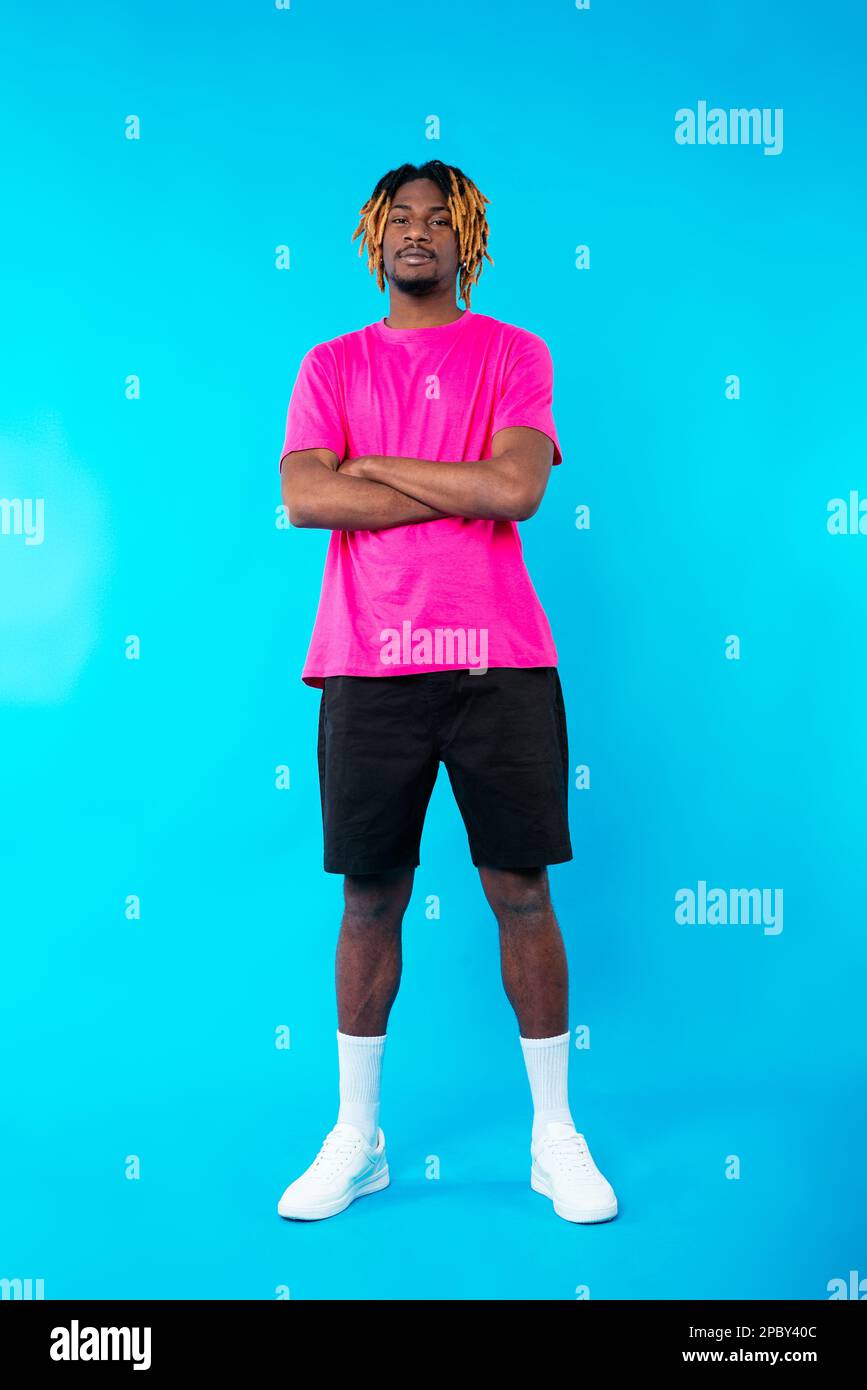 Full body of self assured young African American male model with ...