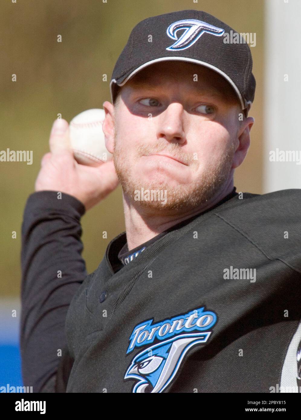 Toronto Blue Jays pitcher Roy Halladay throws during spring training in ...