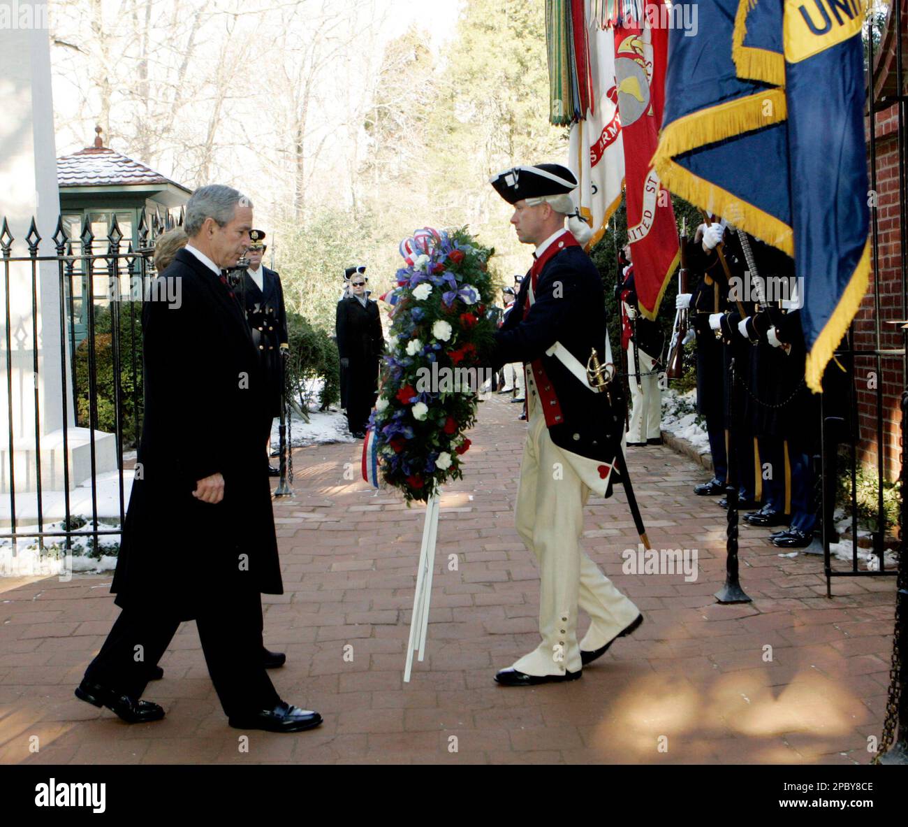 President Bush, left, at the wreath laying ceremonies at the tomb of ...