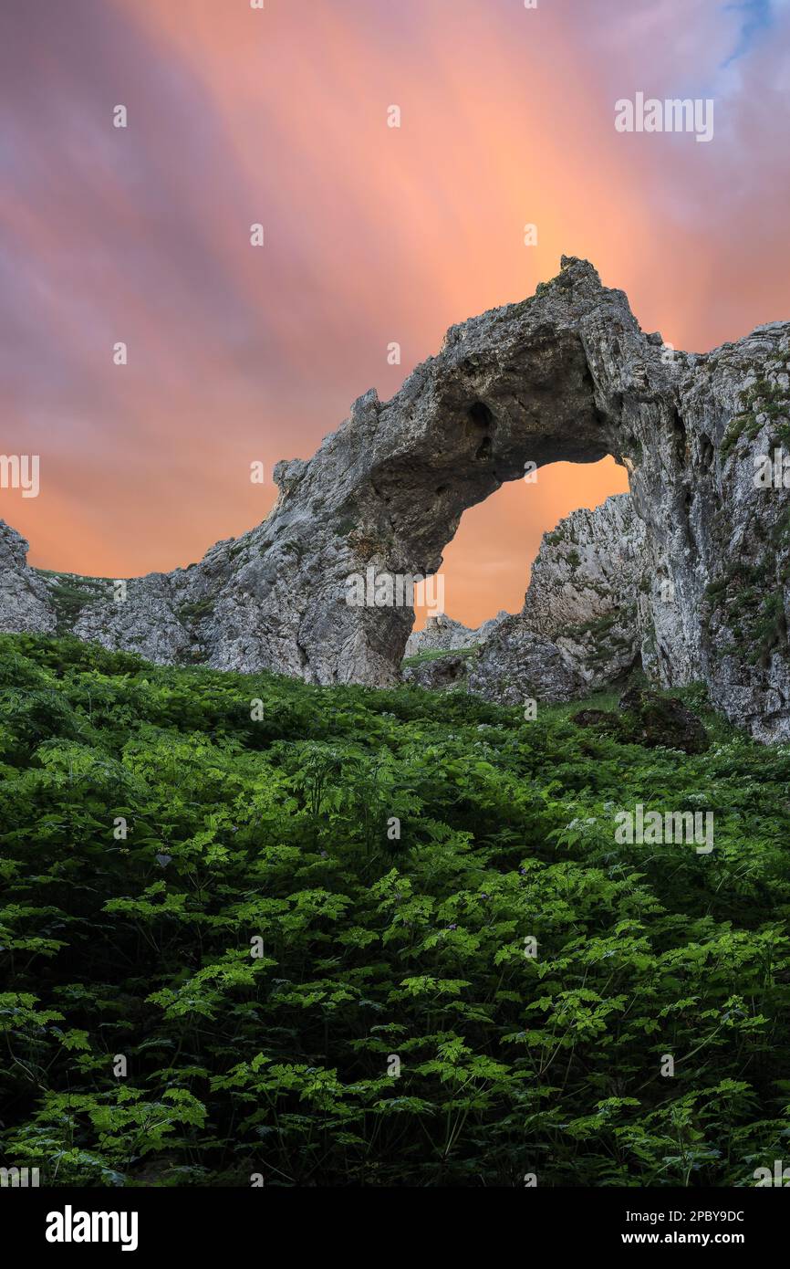 Ground level of Arco de Portupekoleze cave with double hole in rocky ...