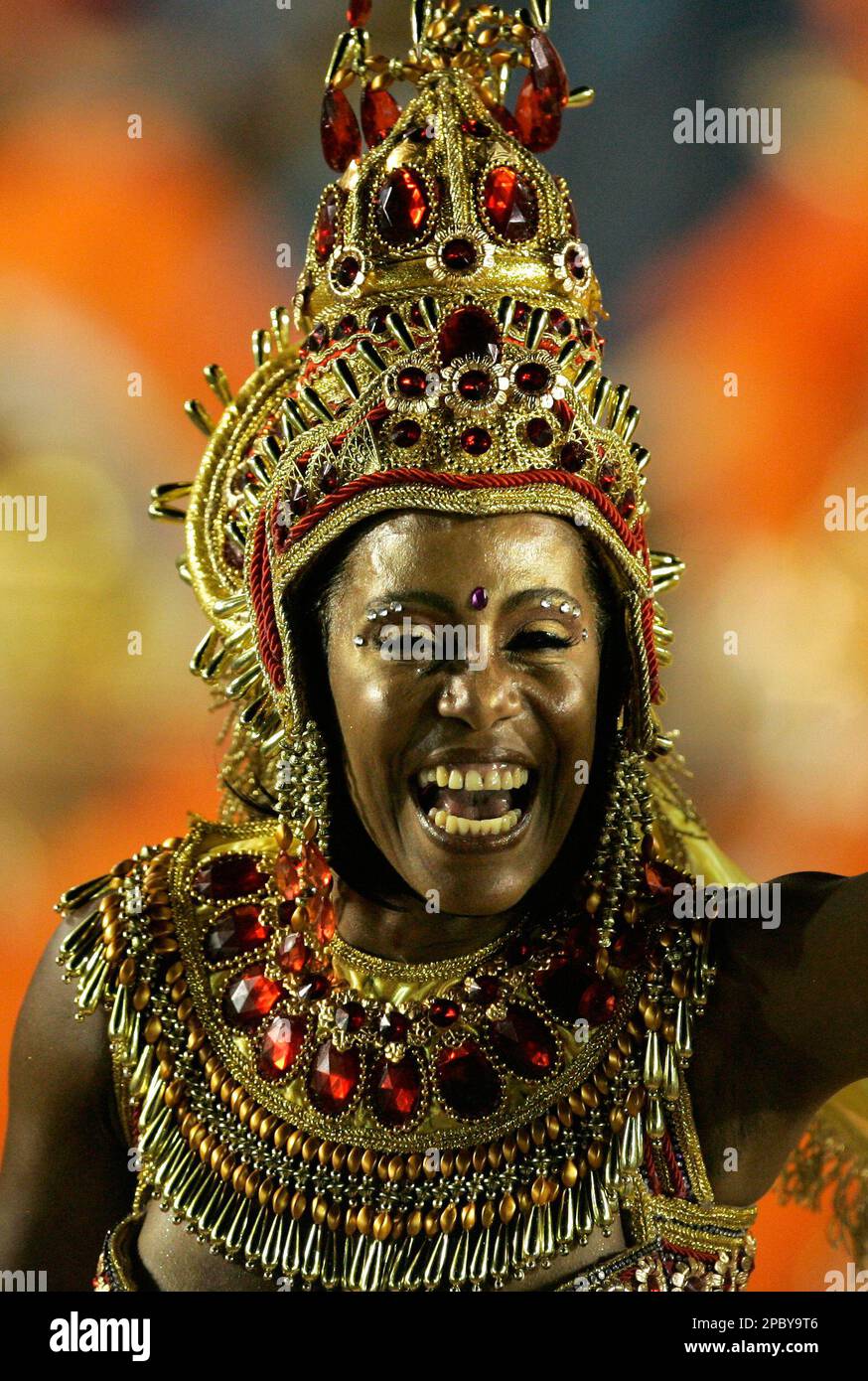 A dancer performs on top of a 'Estacio de Sa' samba school float during ...