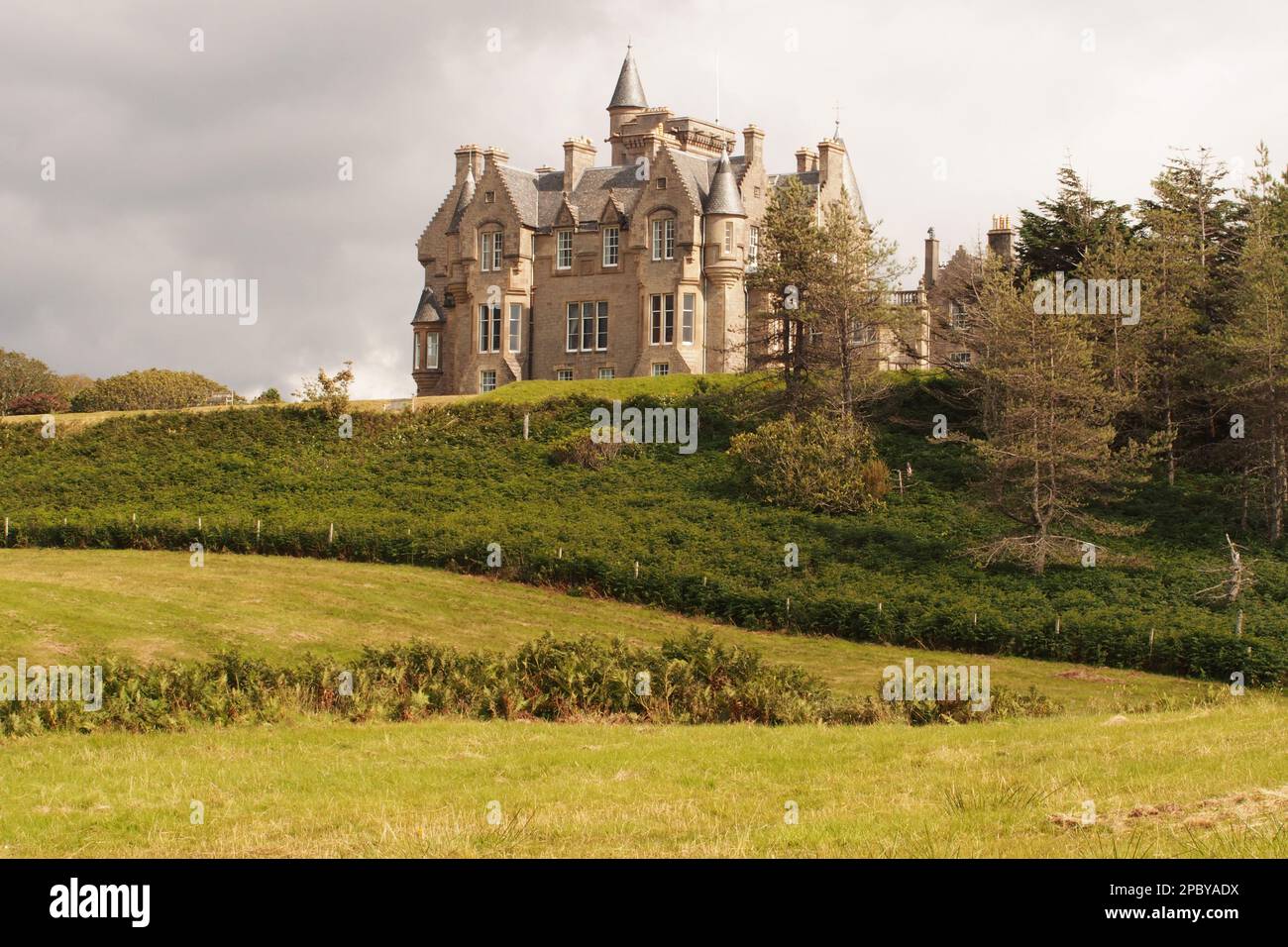 Looking up to Glengorm Castle from the meadows below, on a summers day ...