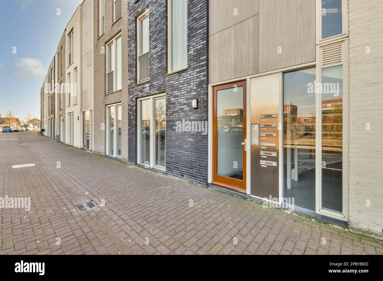 Exterior of modern residential building with windows and doors located ...