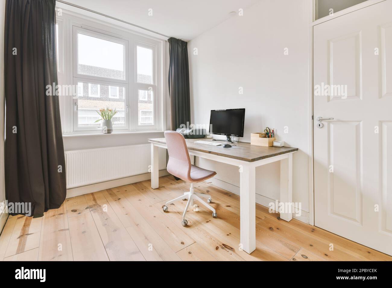 Interior design of study room with wooden table and desktop computer ...