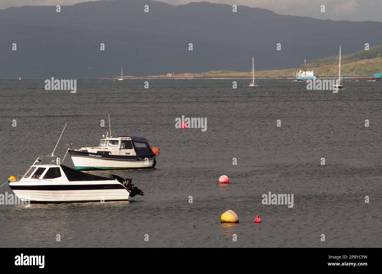 Small boats at anchor in the natural seaport at Tobermory, Mull ...